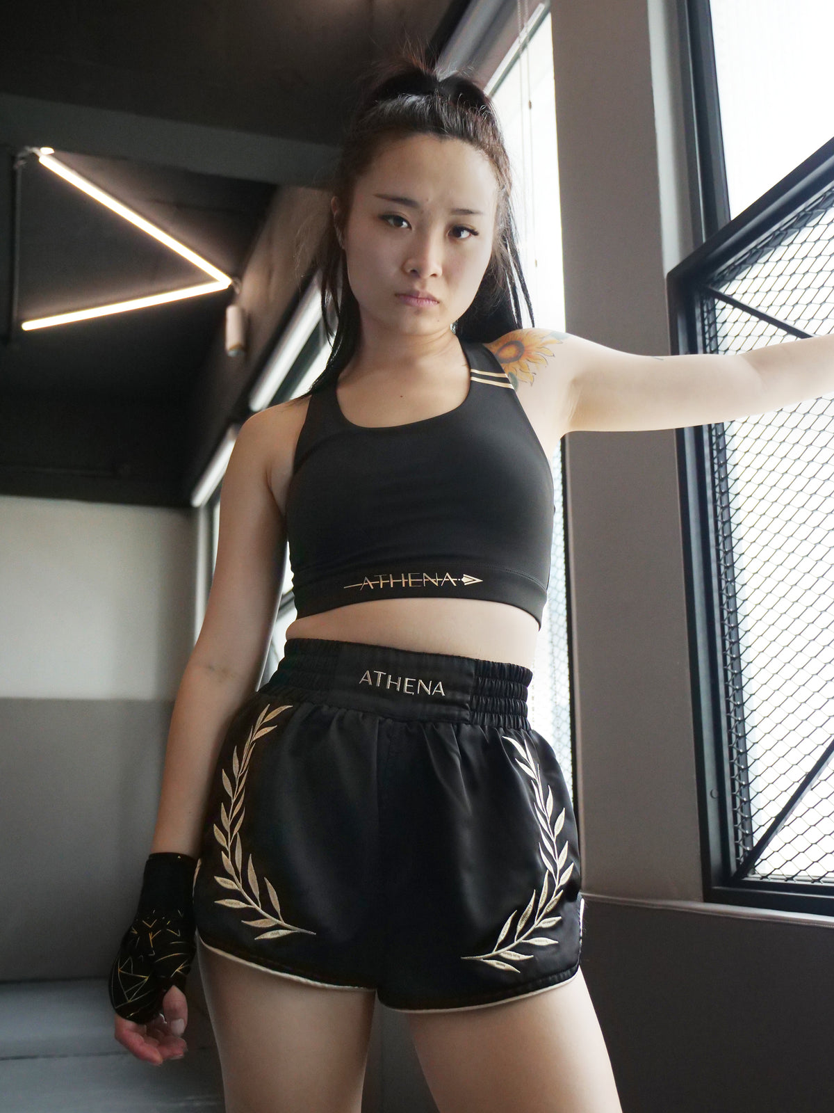 Athena Women's Muay Thai Shorts (Black/Gold) with extra wide hips